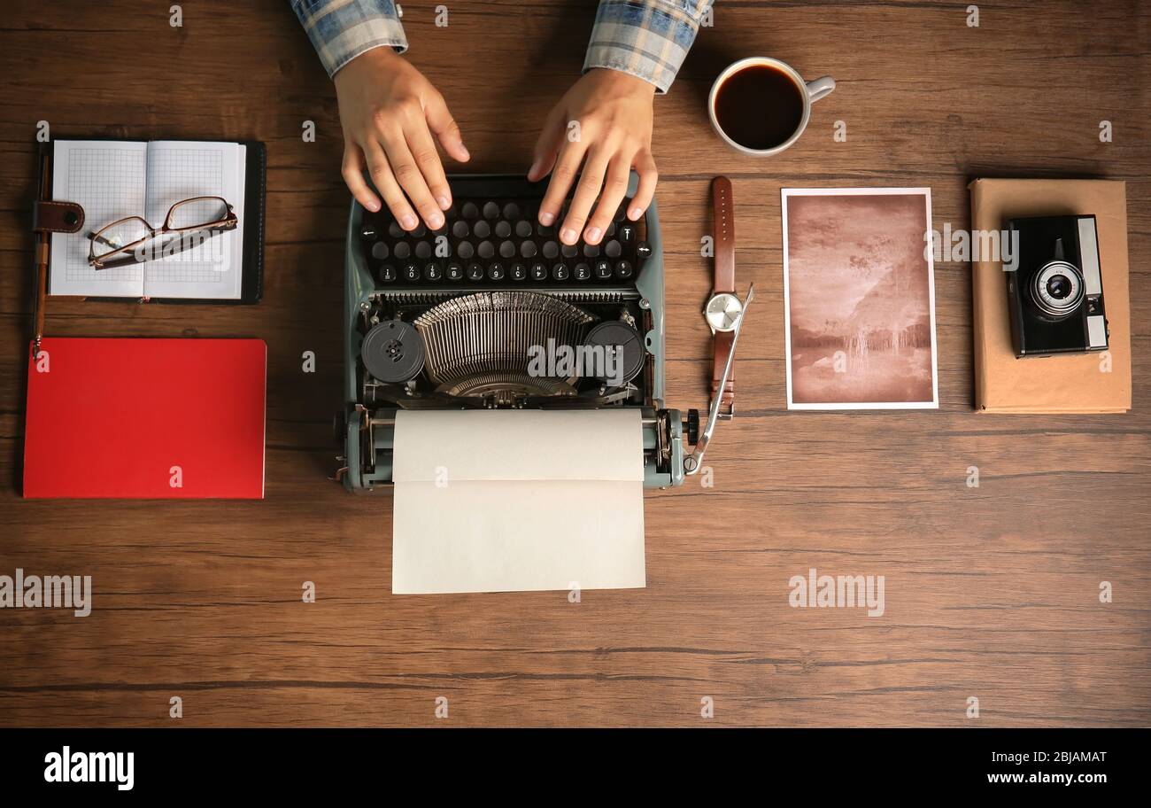 Retro reporter working at the table, top view Stock Photo - Alamy