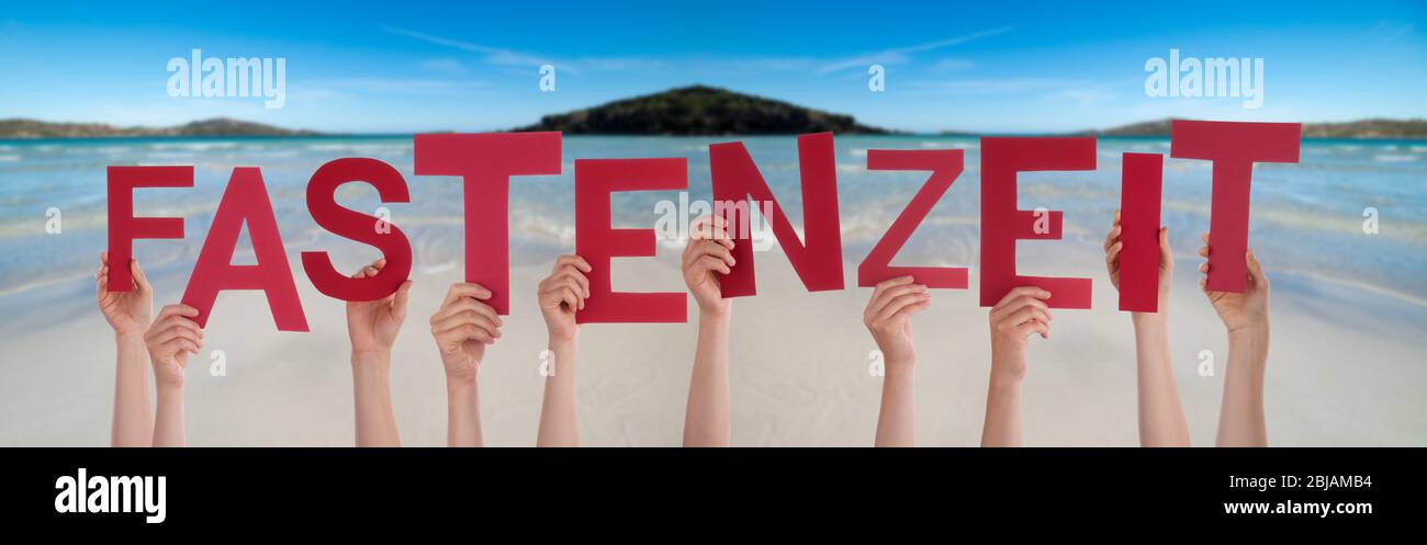 People Hands Holding Word Fastenzeit Means Fasting, Ocean Background ...