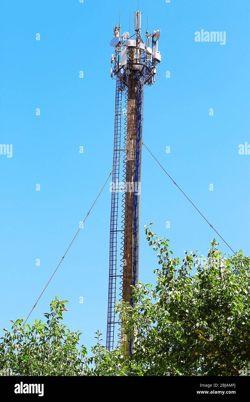 Communications tower on sky background Stock Photo - Alamy