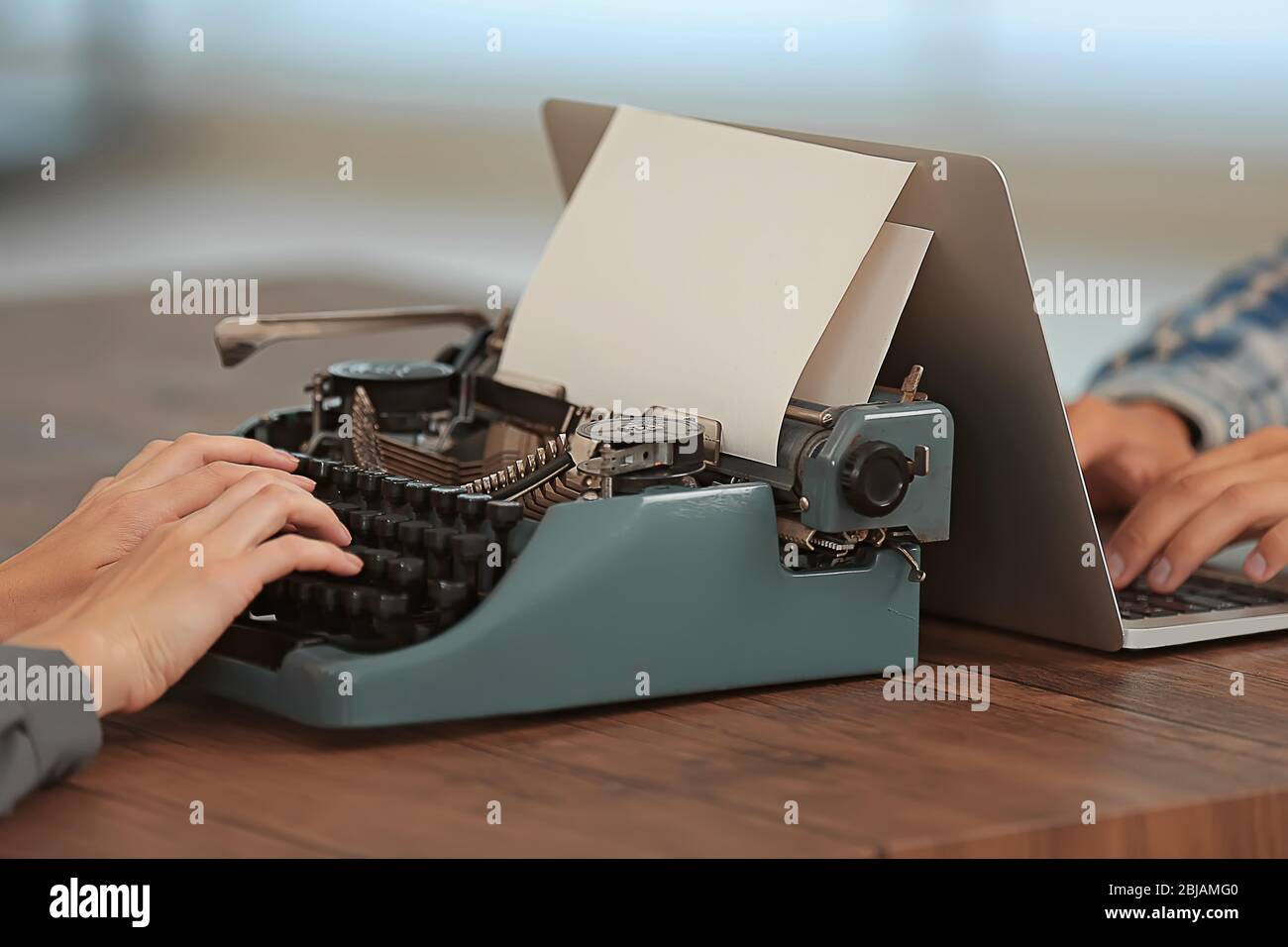 Old typewriter and laptop, concept of technology progress Stock Photo ...