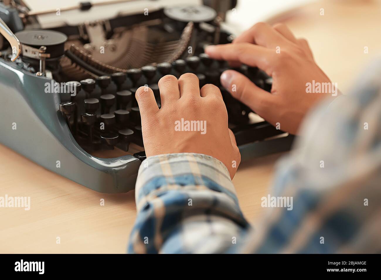 Man working at typewriter hi-res stock photography and images - Alamy