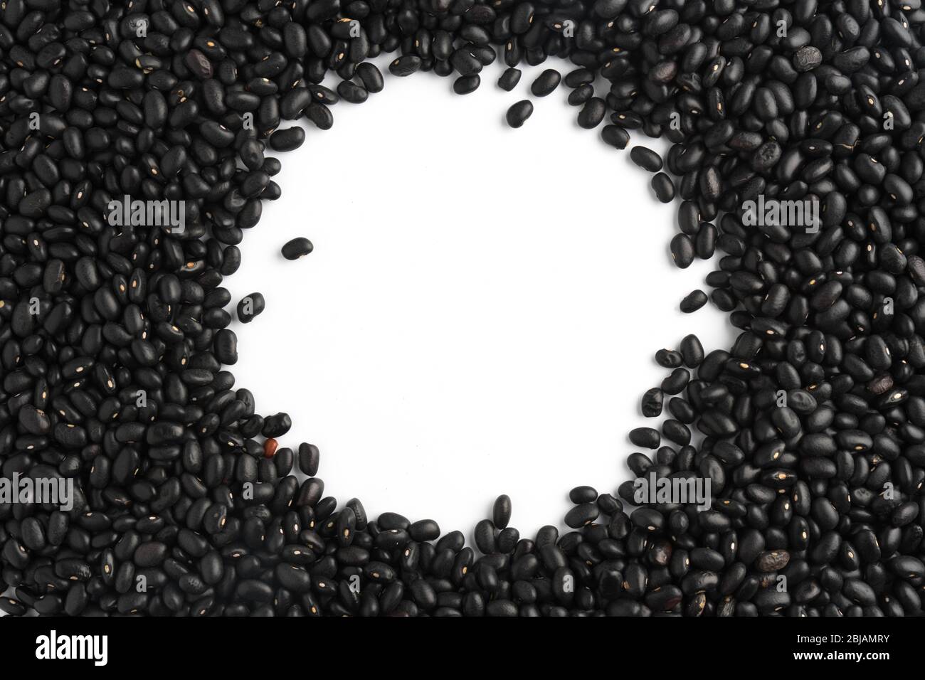 Black beans circle on the white background Stock Photo - Alamy