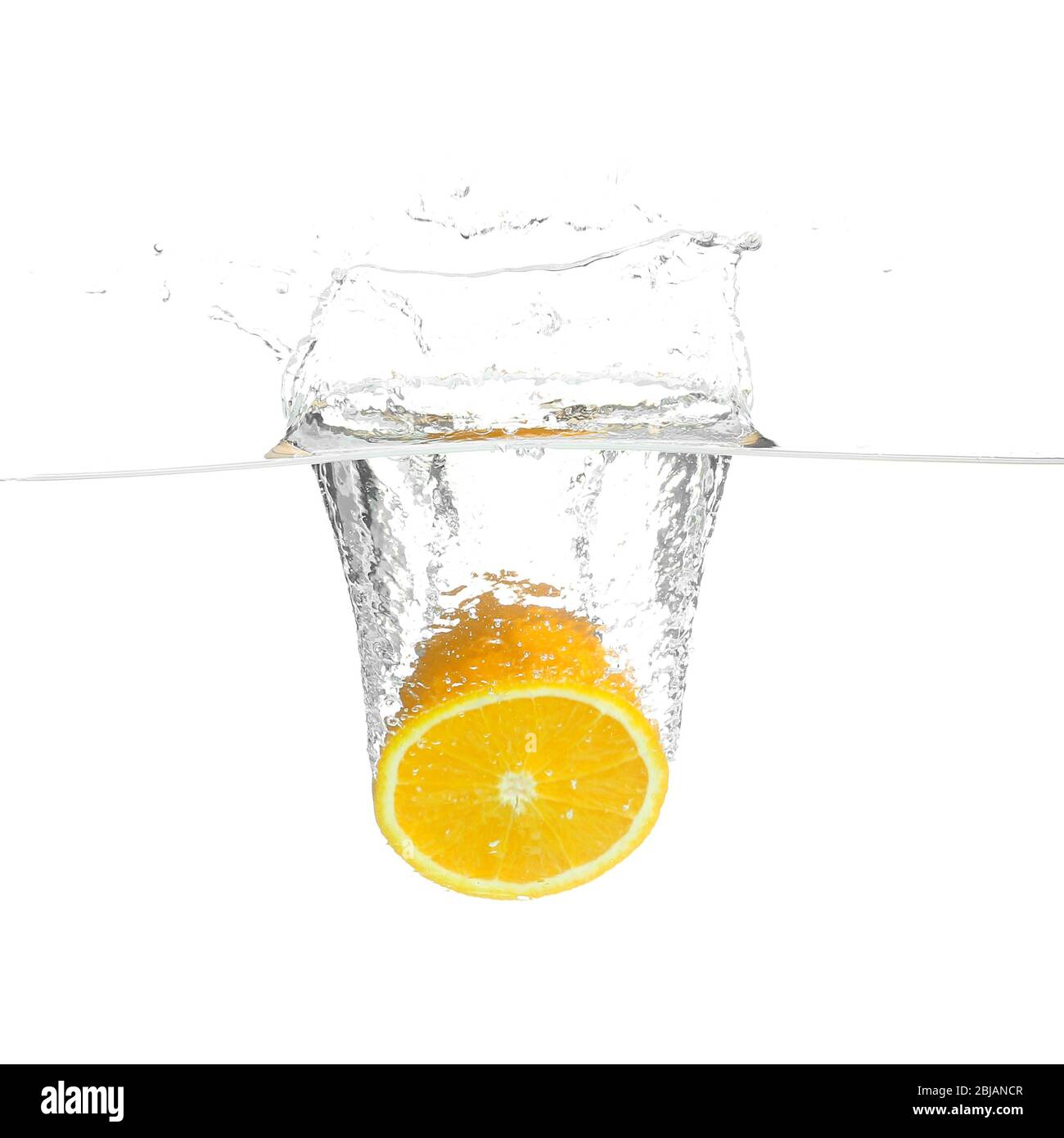 Fresh orange falling in water isolated on white Stock Photo - Alamy