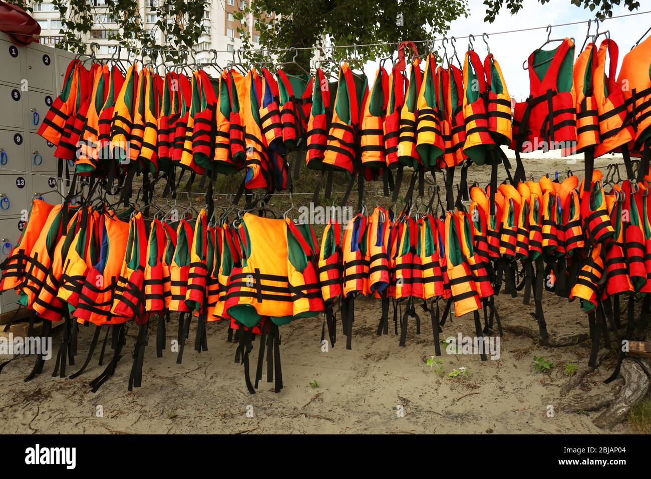 Life jacket hanging on rope Stock Photo - Alamy