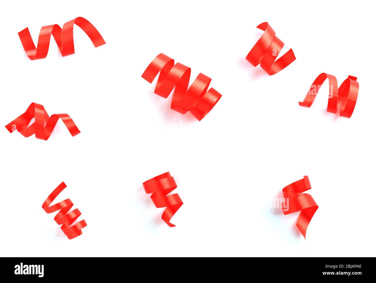 red ribbon on a white background Stock Photo - Alamy