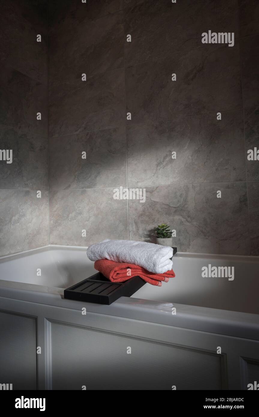 Bath rack across a bath in a contemporary bathroom in a modern house ...