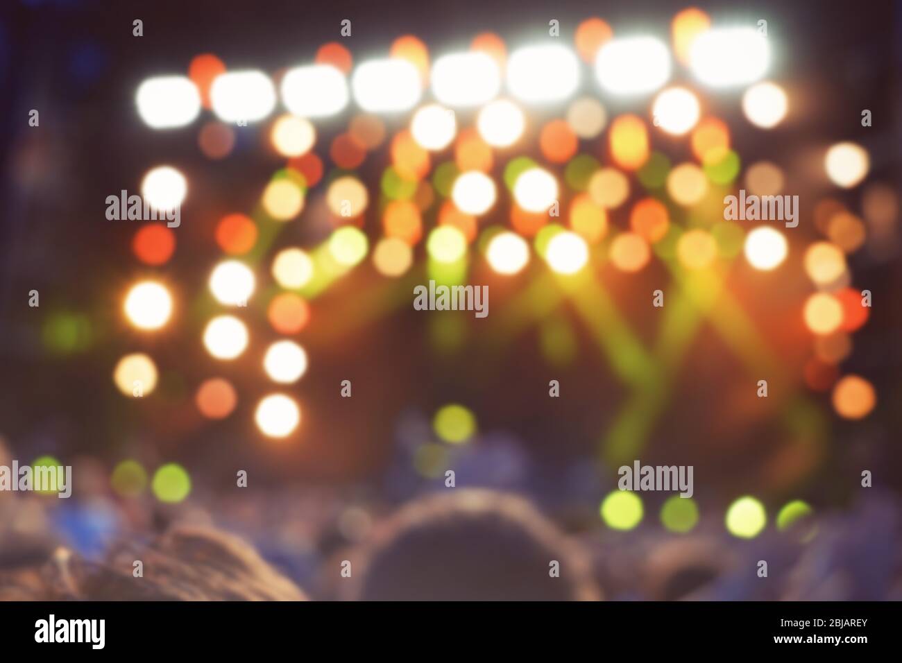 Blurred background of a crowd at a open air concert Stock Photo - Alamy