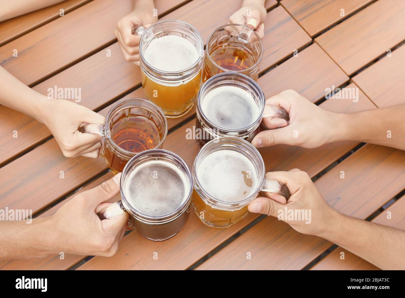 People drinking beer in cafe Stock Photo - Alamy