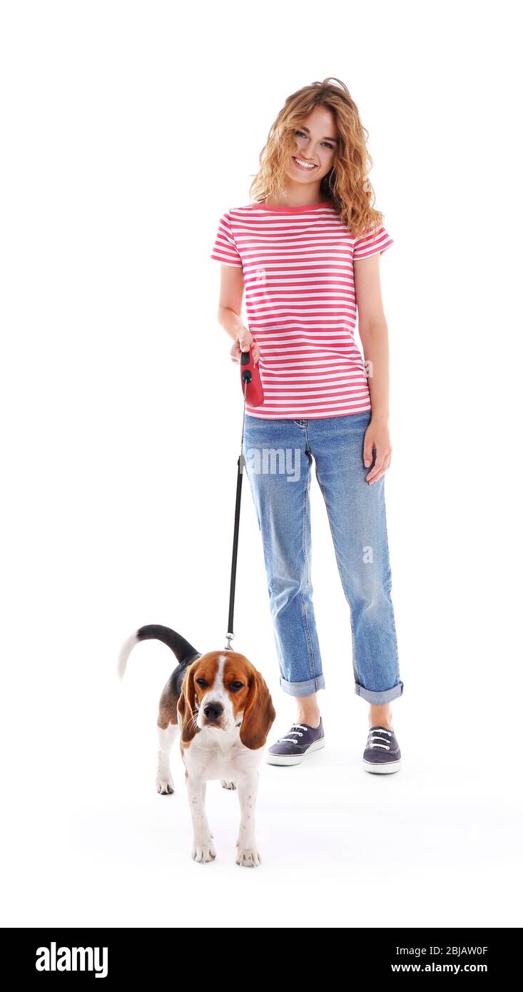Young woman walking dog isolated on white Stock Photo - Alamy