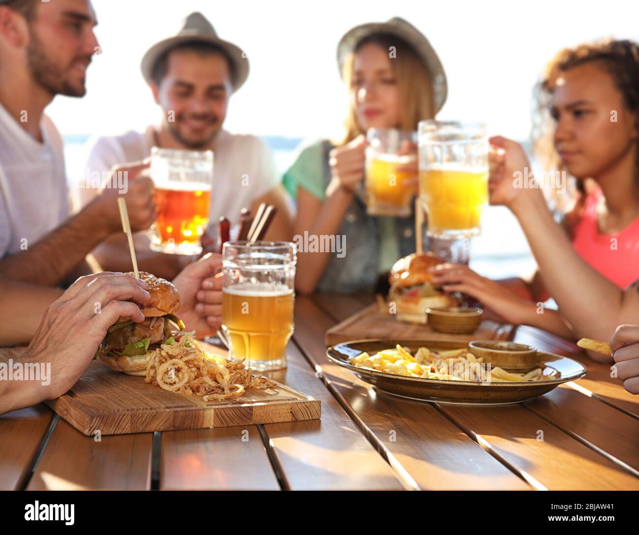 Woman drinking and eating snacks hi-res stock photography and images ...