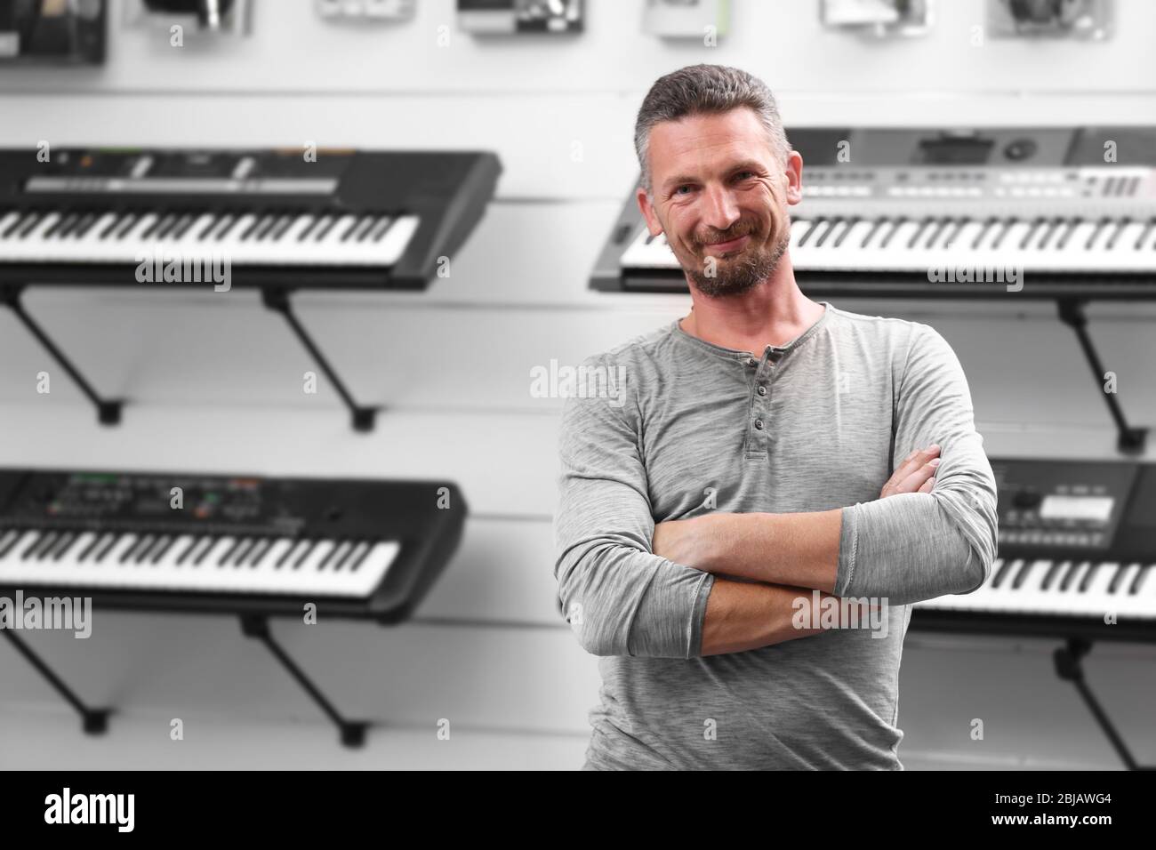 Musician male choosing keyboard hi-res stock photography and images - Alamy