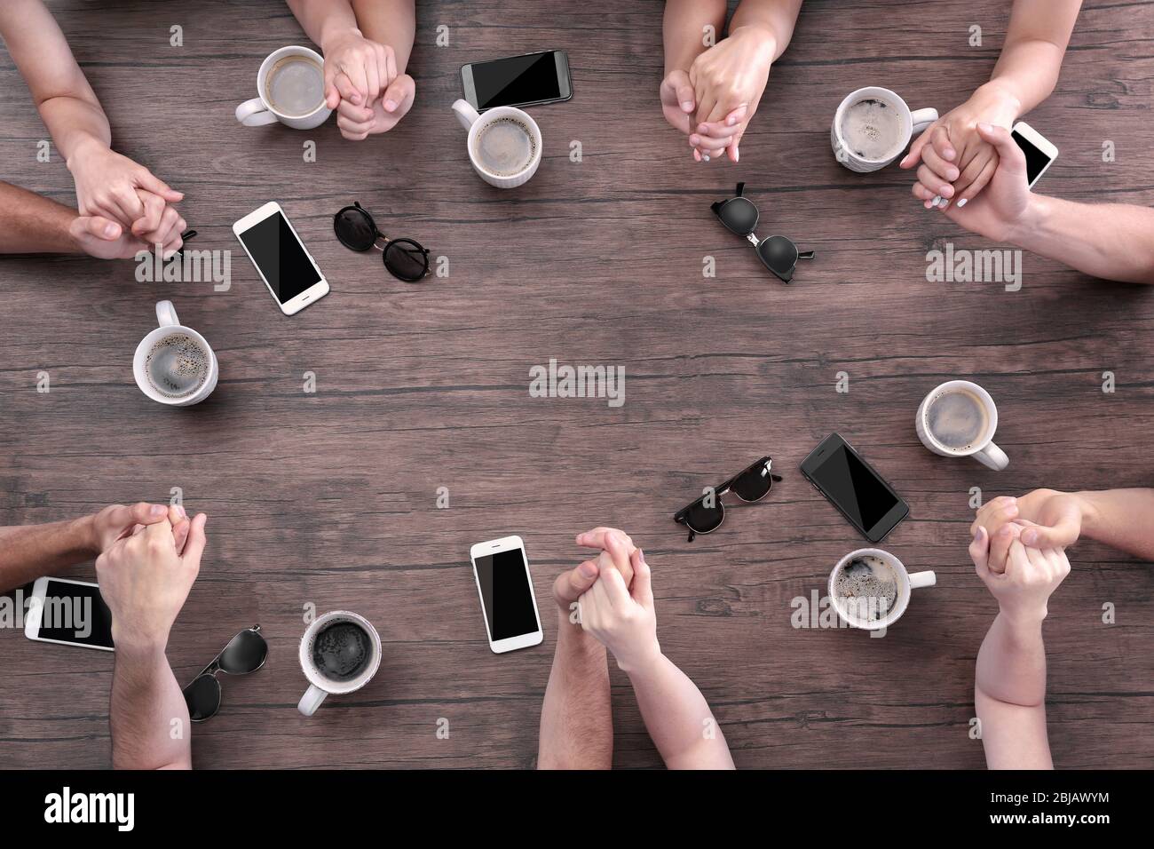 Group of people drinking coffee together Stock Photo - Alamy