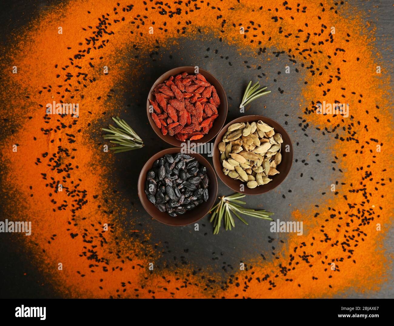 Dried spices in bowls hi-res stock photography and images - Alamy