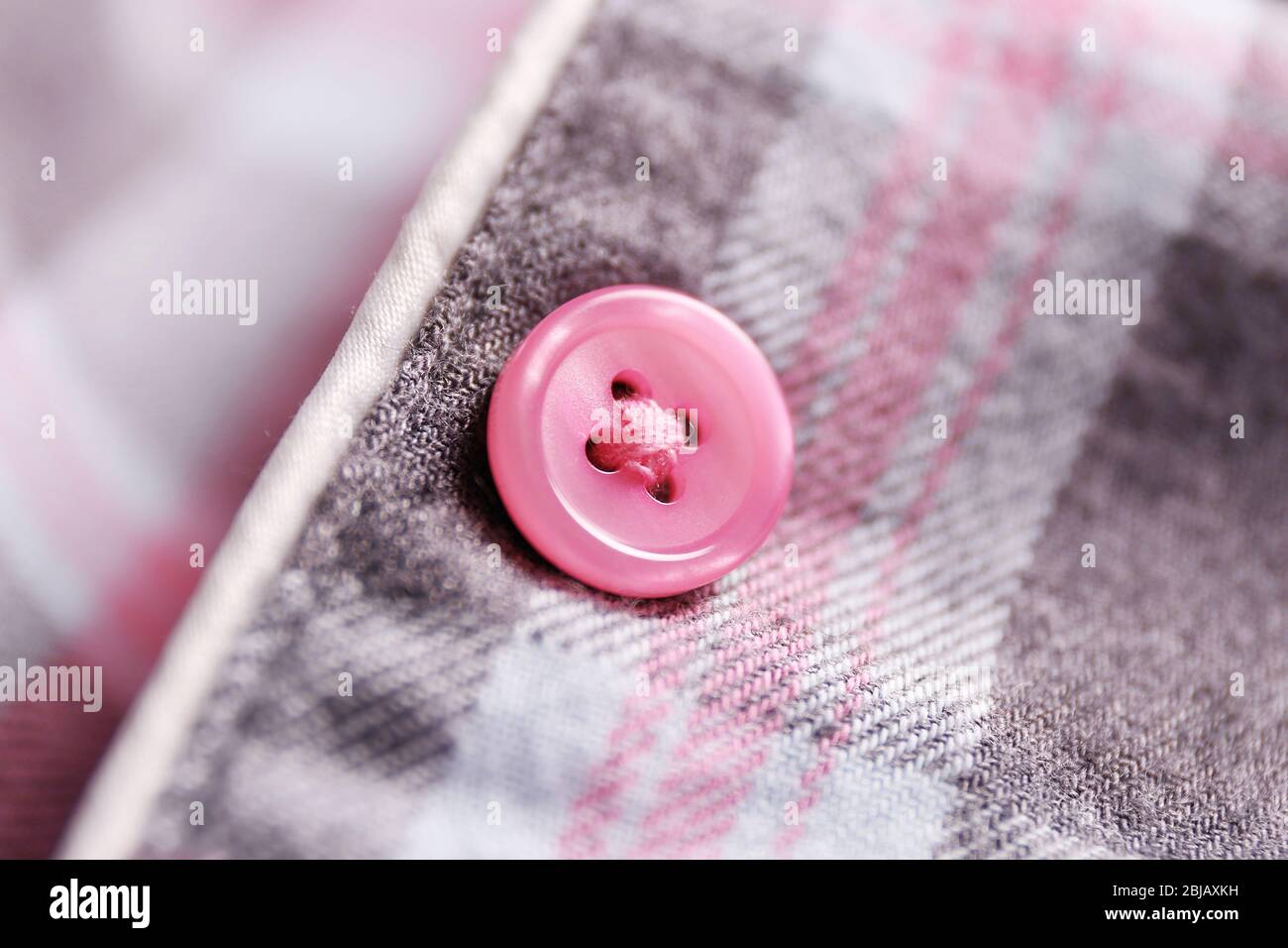 Small white shirt button hi-res stock photography and images - Alamy