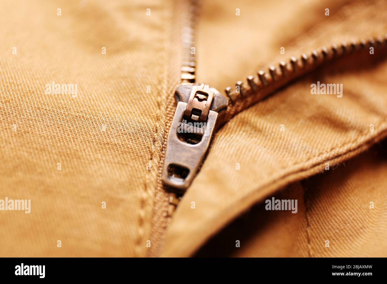 Detail of zipper on denim cloth Stock Photo - Alamy