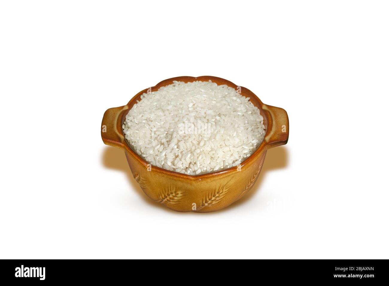 white rice in ceramic bowl, white background Stock Photo - Alamy
