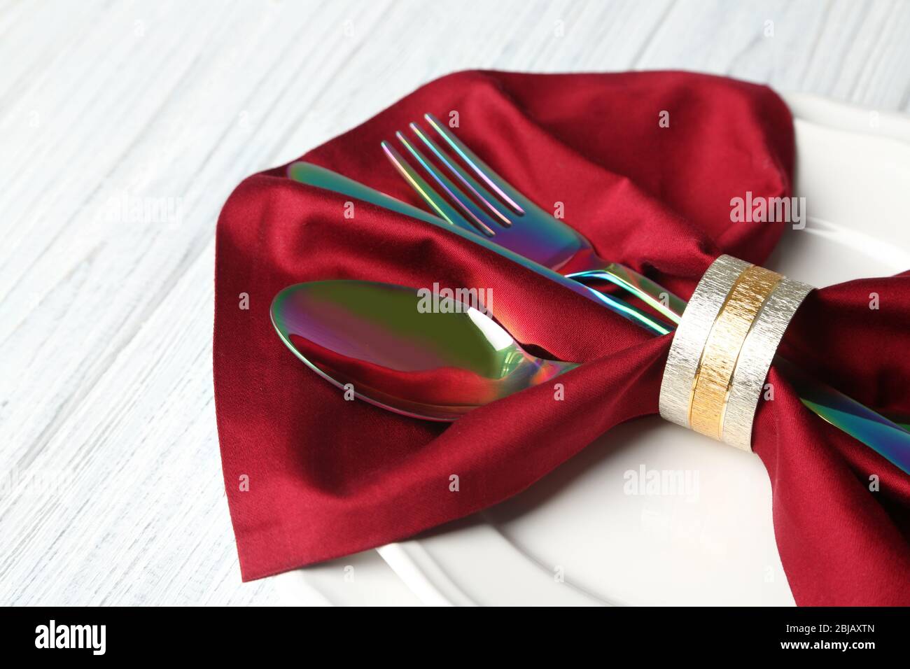 Christmas table setting on wooden background Stock Photo - Alamy
