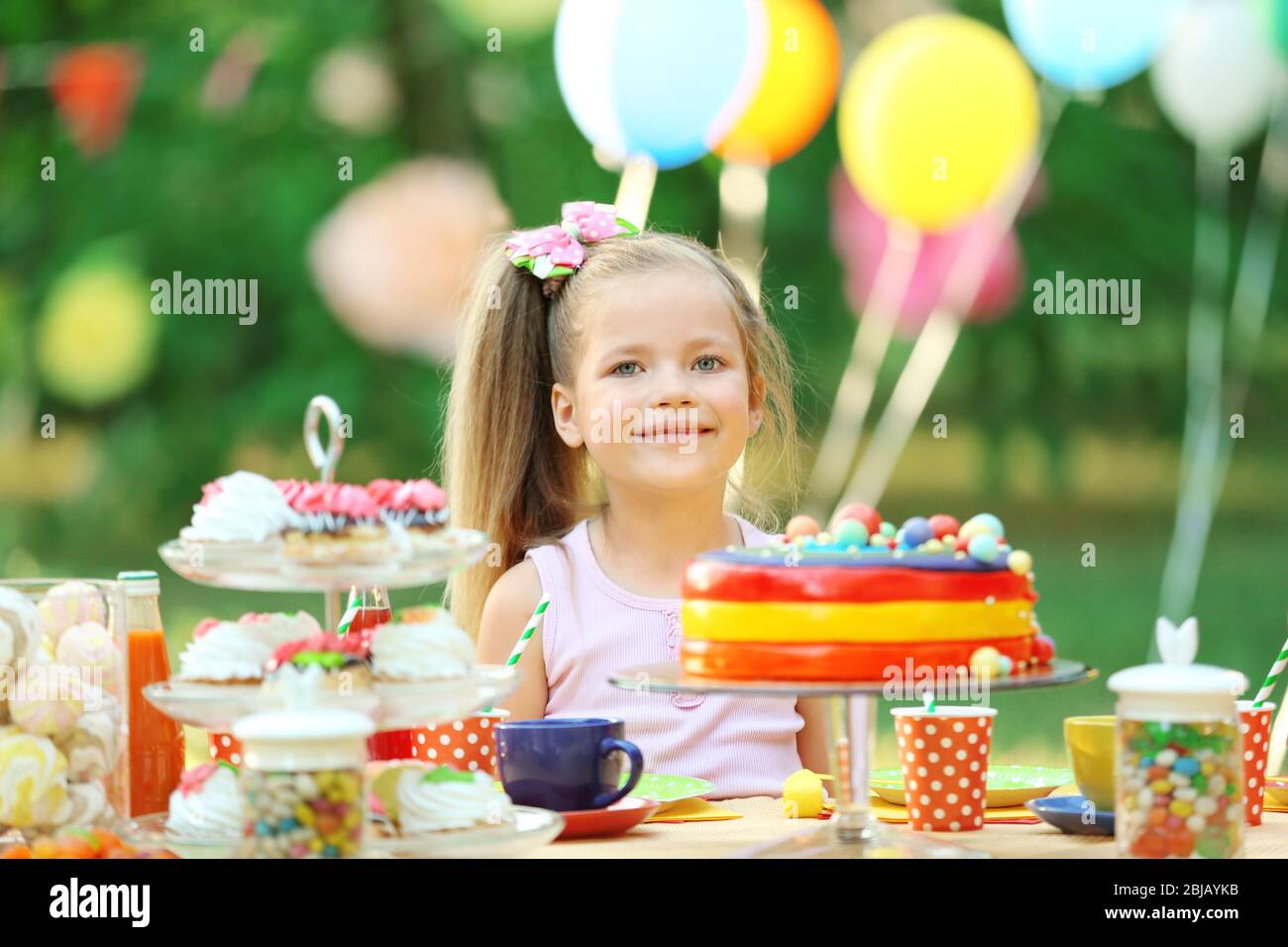 Cute girl on birthday party Stock Photo - Alamy