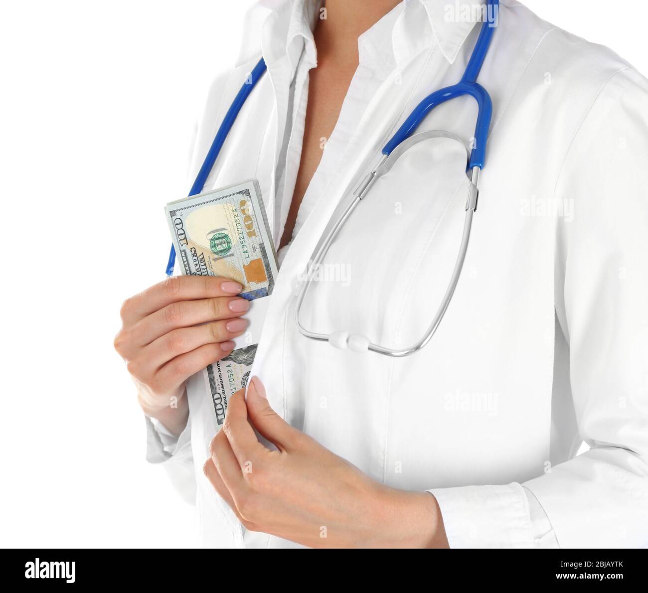 Female doctor with money on white background Stock Photo - Alamy