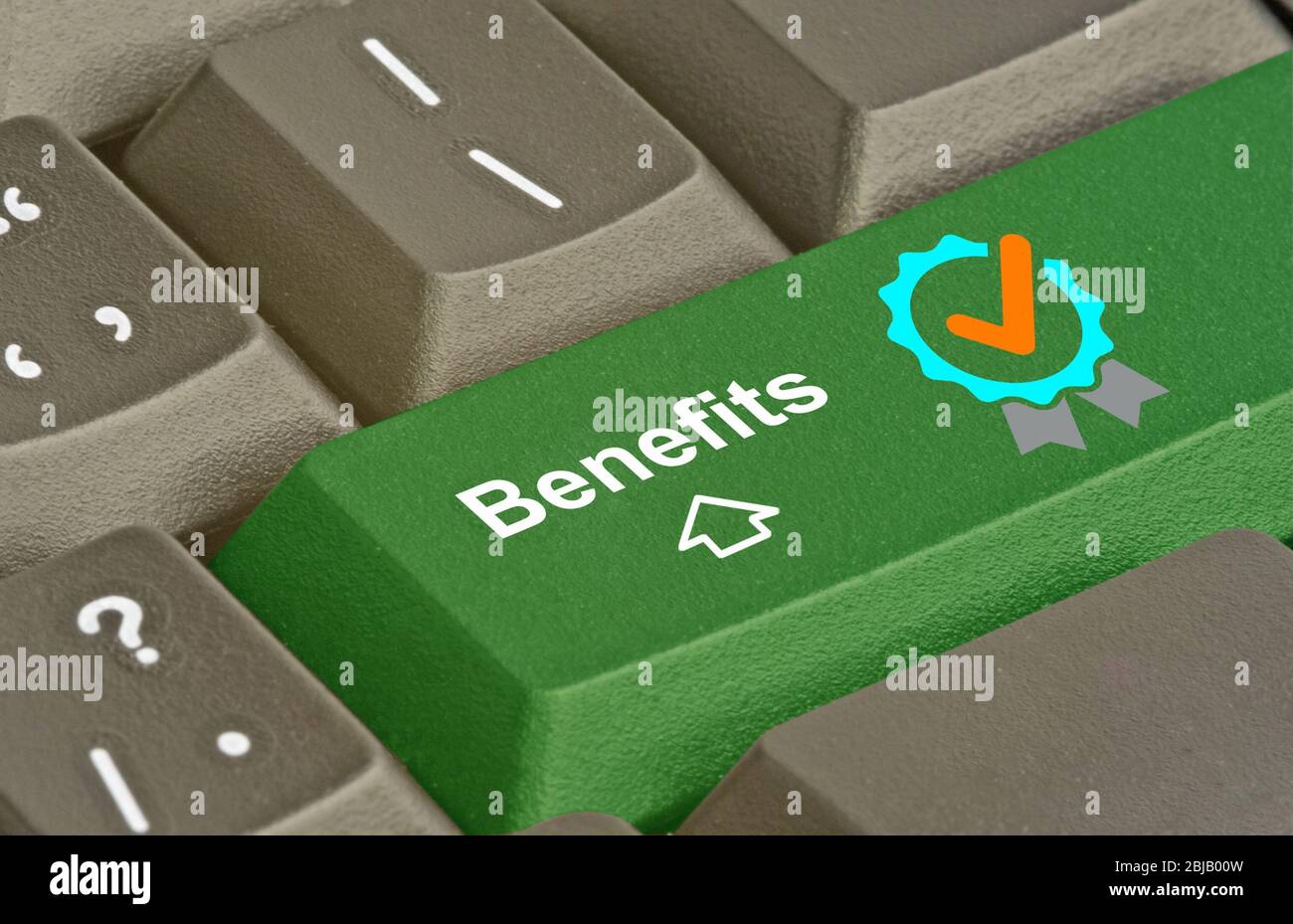 Keyboard with key for benefits Stock Photo - Alamy
