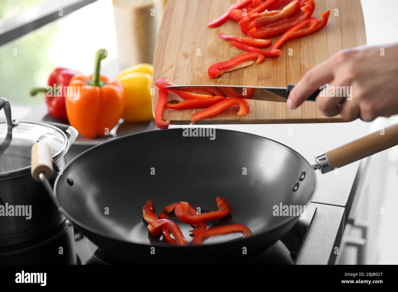 Closeup man hands putting sliced hi-res stock photography and images ...