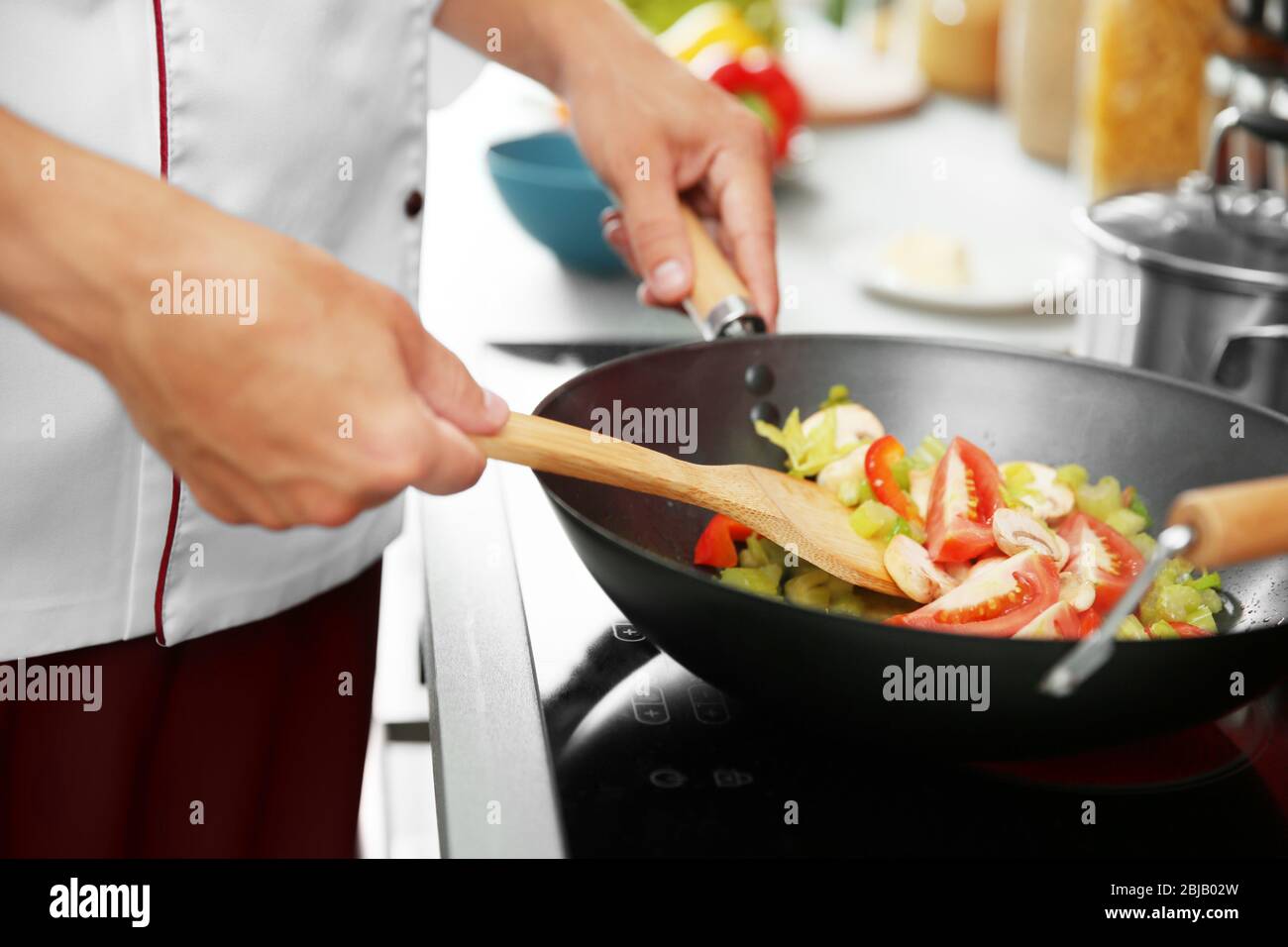 Closeup female hands mixing vegetable hi-res stock photography and ...
