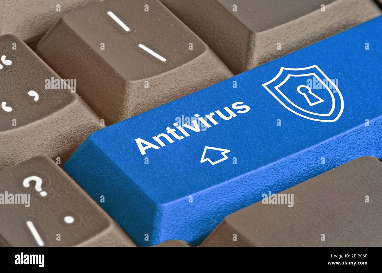 Keyboard with key for antivirus Stock Photo - Alamy
