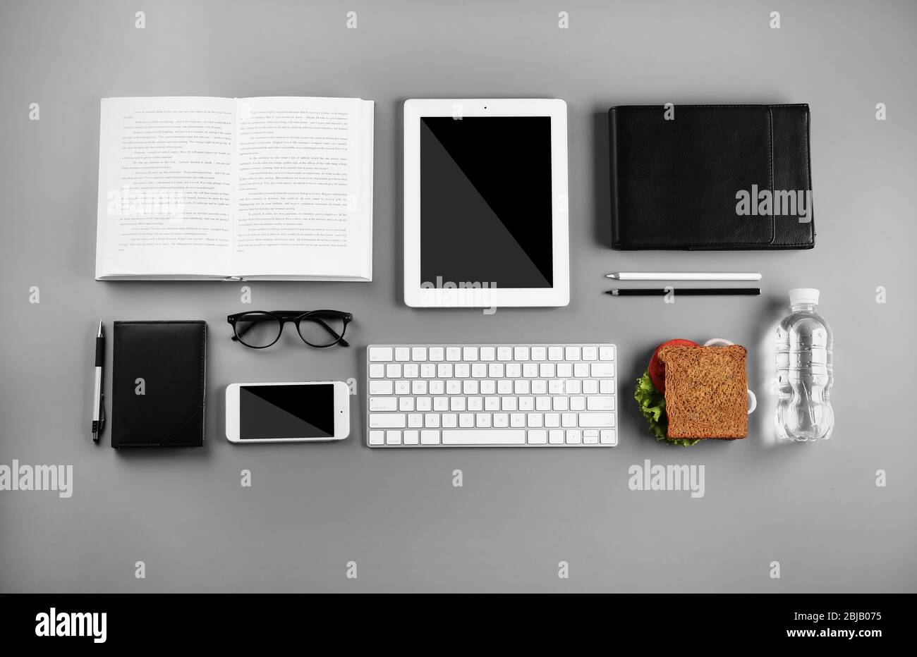 Workplace with office tools and devices Stock Photo - Alamy