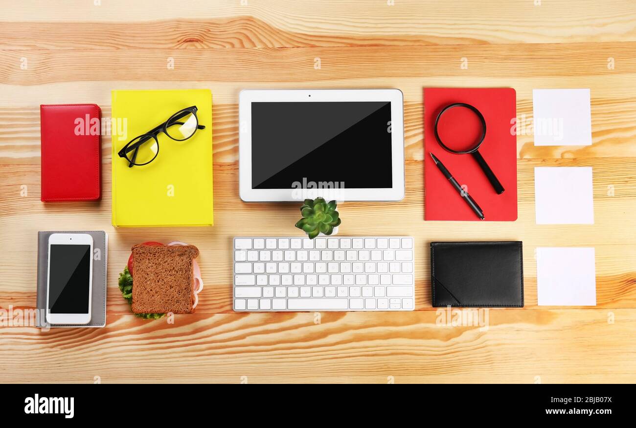 Workplace with office tools and devices Stock Photo - Alamy