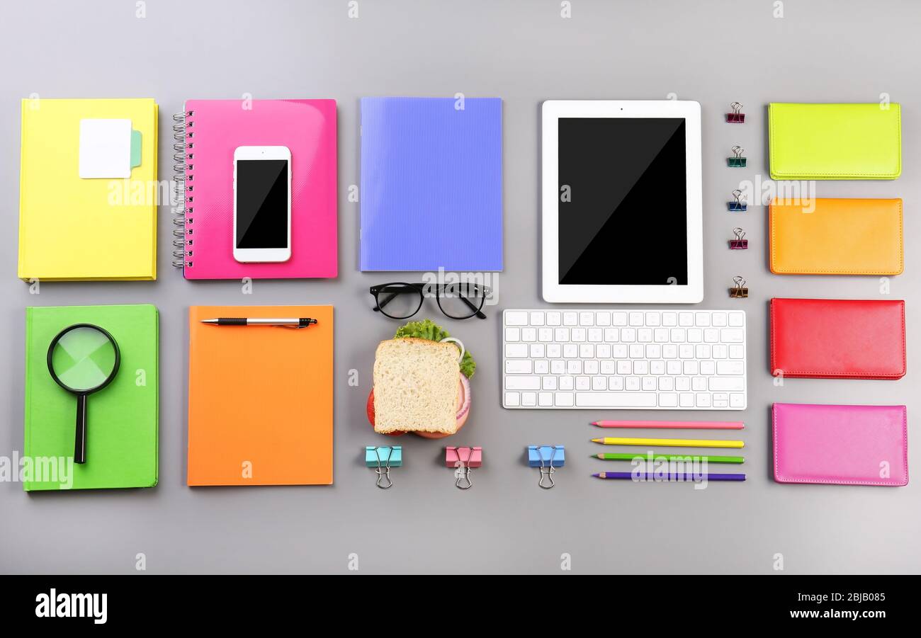 Workplace with office tools and devices Stock Photo - Alamy