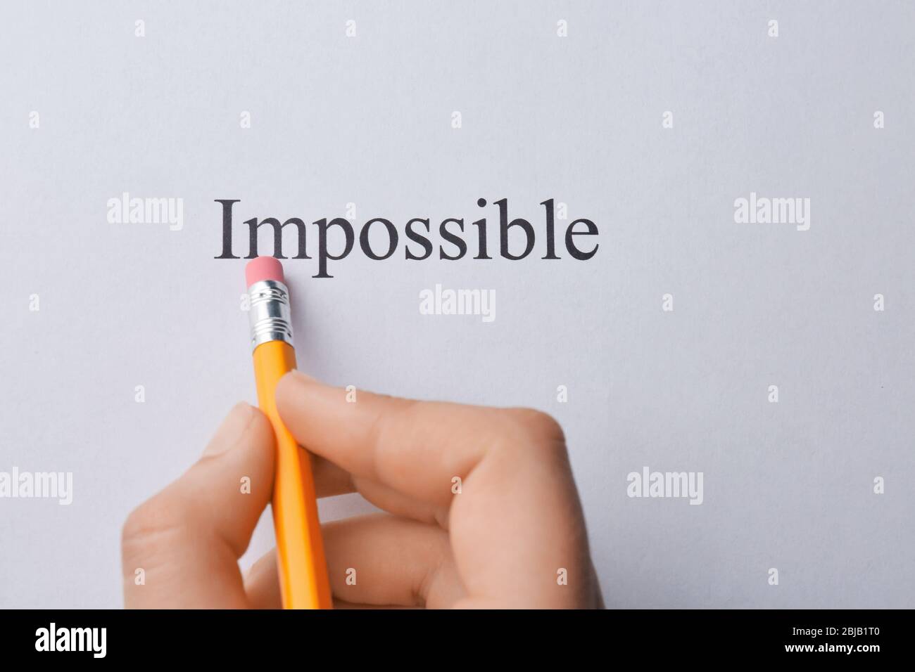 Hand erasing word impossible on paper Stock Photo - Alamy Hand erasing word impossible on paper Stock Photo - Alamy