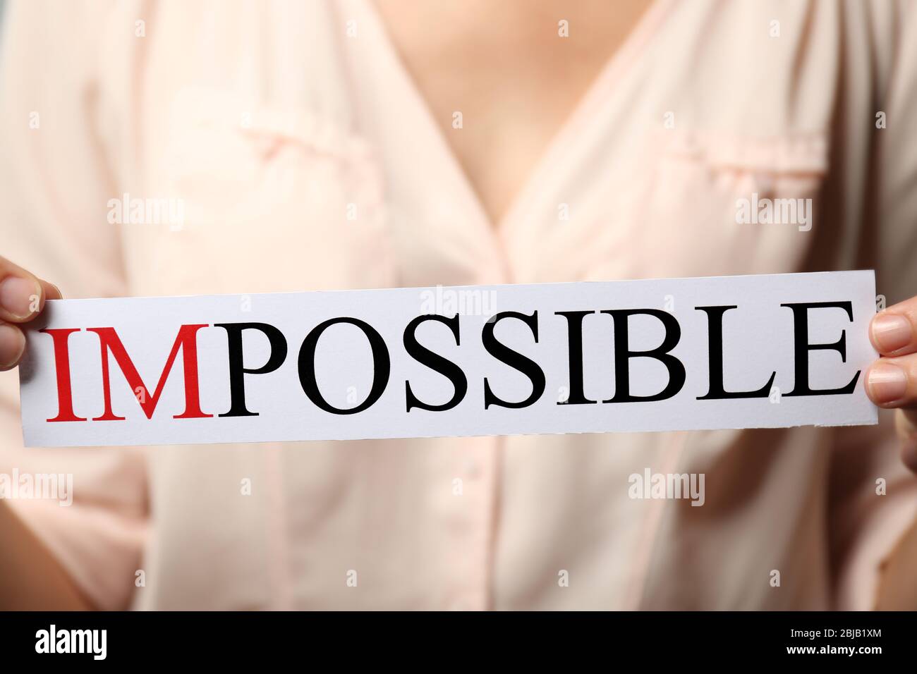 Female hands holding text challenge hi-res stock photography and images ...