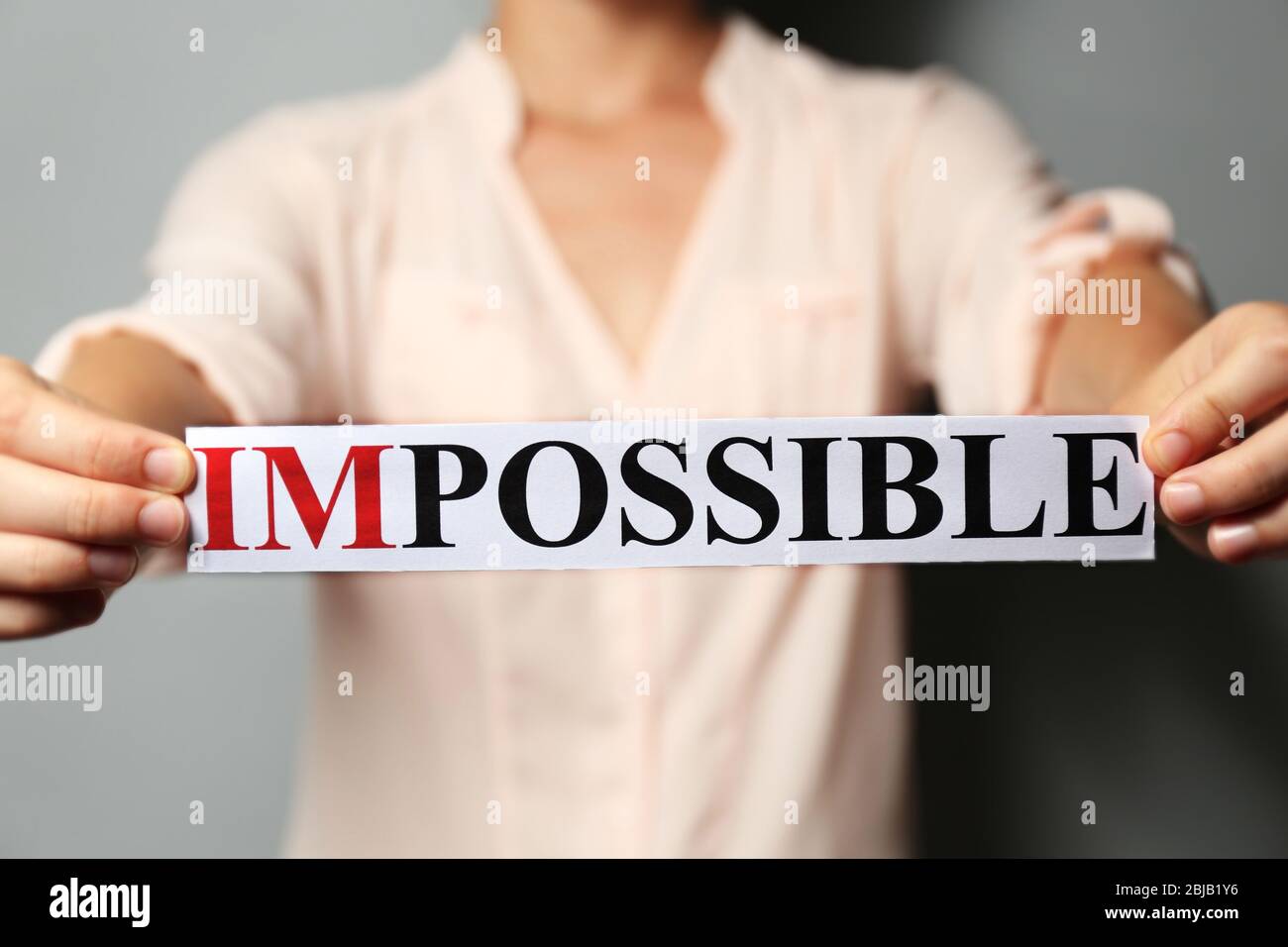 Female hands holding text challenge hi-res stock photography and images ...