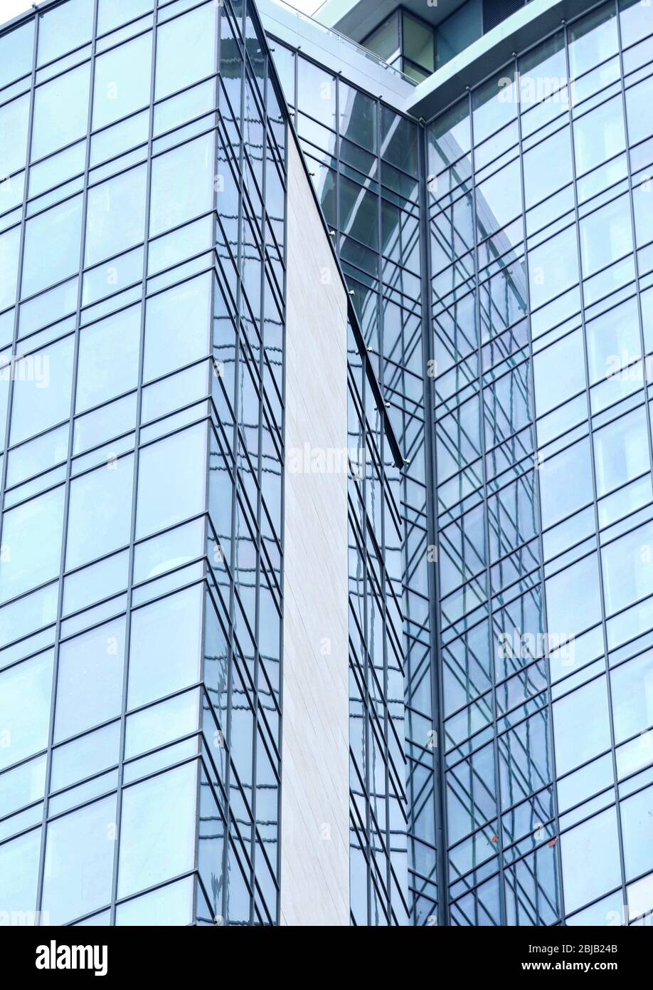 Modern skyscraper with panoramic windows Stock Photo - Alamy