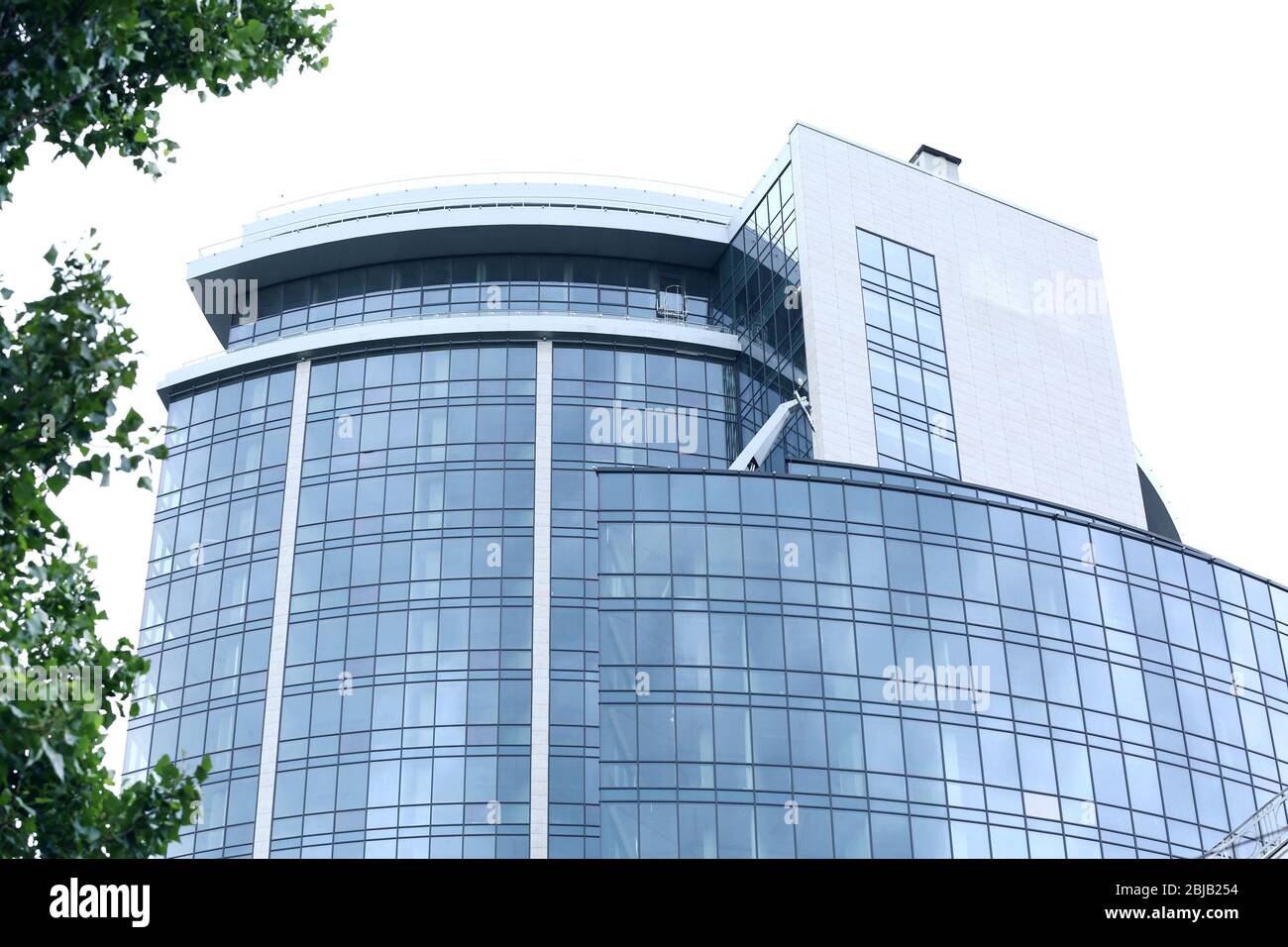 Modern skyscraper with panoramic windows Stock Photo - Alamy