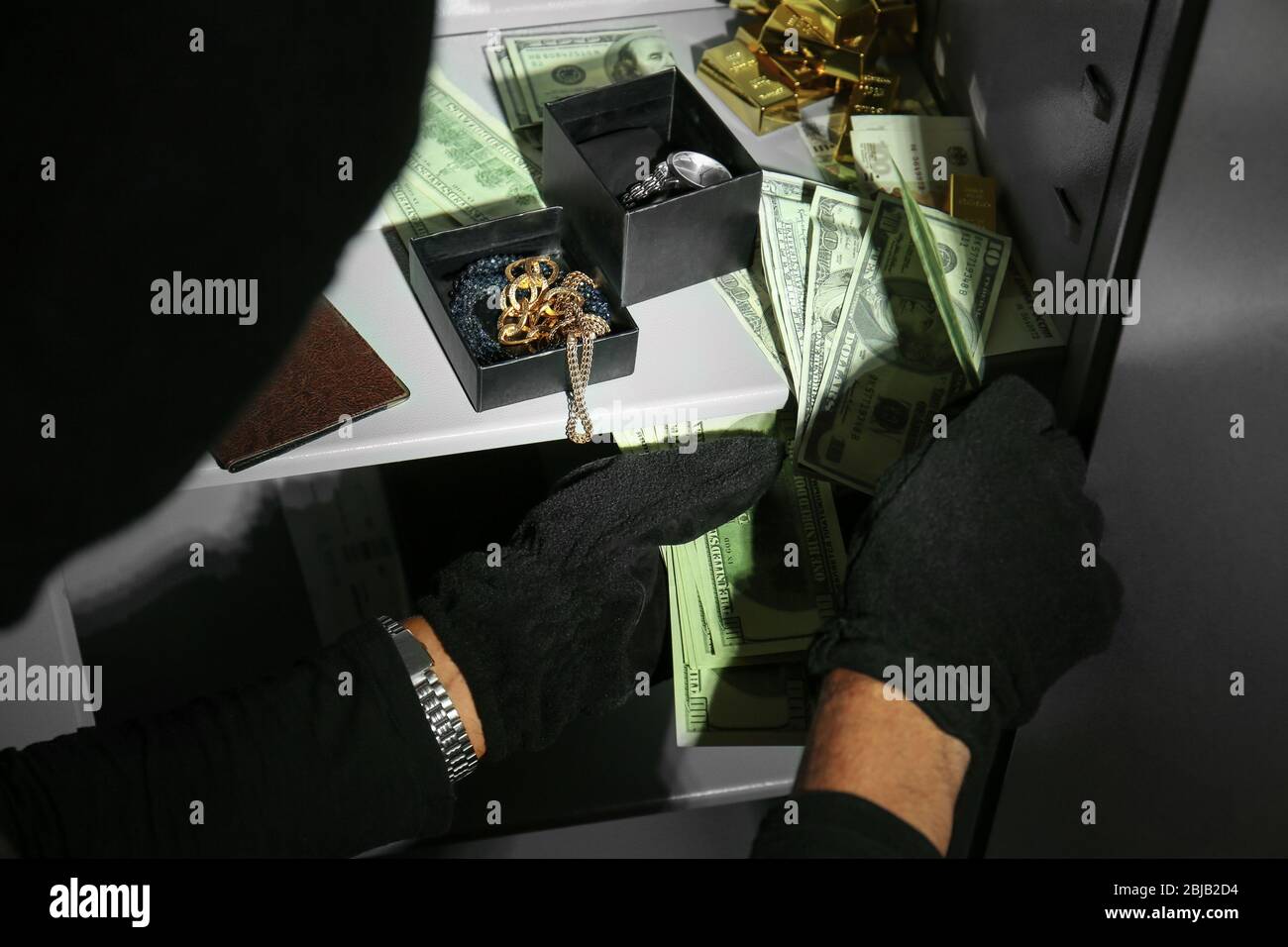 Stealing Money High Resolution Stock Photography and Images - Alamy