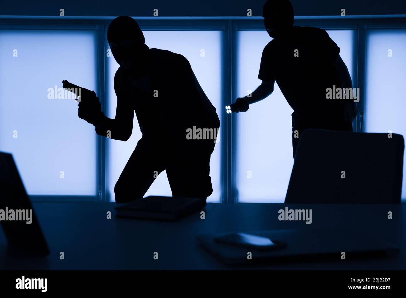 Burglar entering dark room hi-res stock photography and images - Alamy