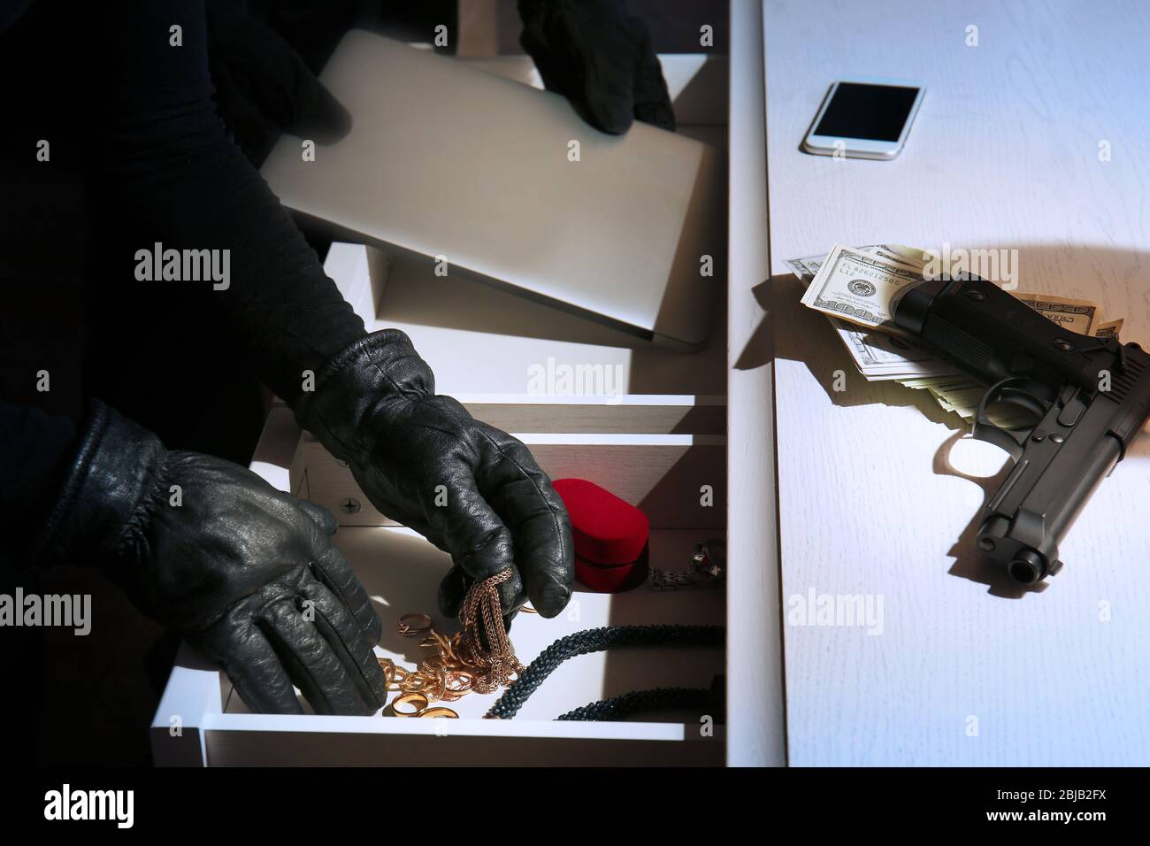 Thieves gloves hi-res stock photography and images - Alamy