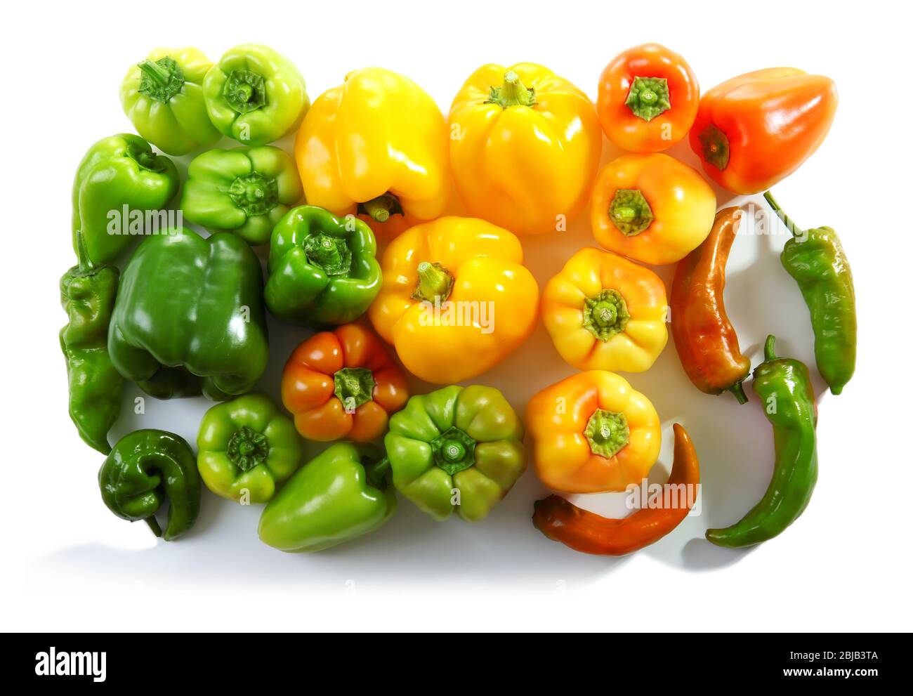Fresh peppers on white background Stock Photo - Alamy