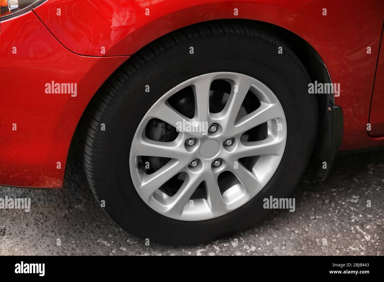 Red car wheel, close up Stock Photo - Alamy