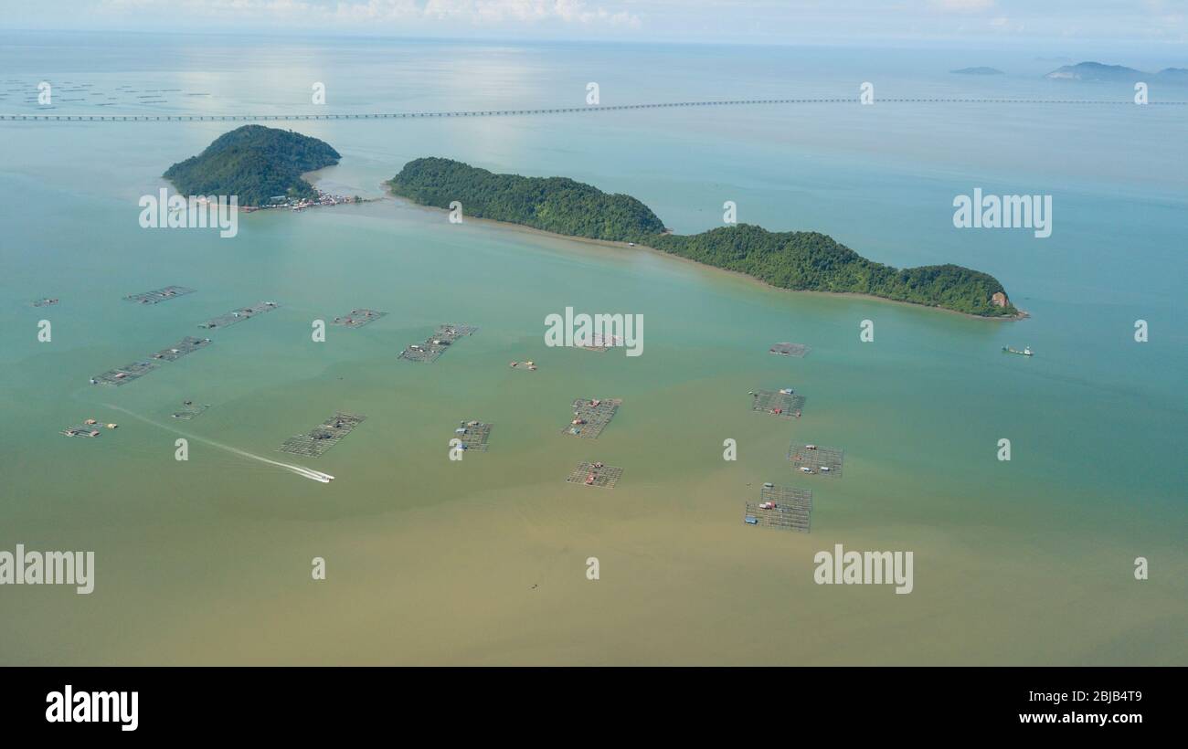 Aerial view boat move near fish farm at sea near Pulau Aman and Pulau ...