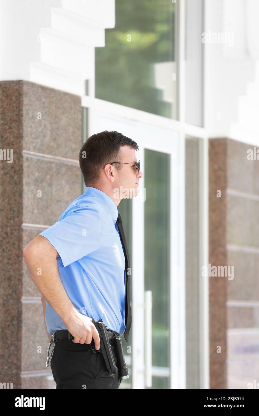 Male security guard outdoors Stock Photo - Alamy
