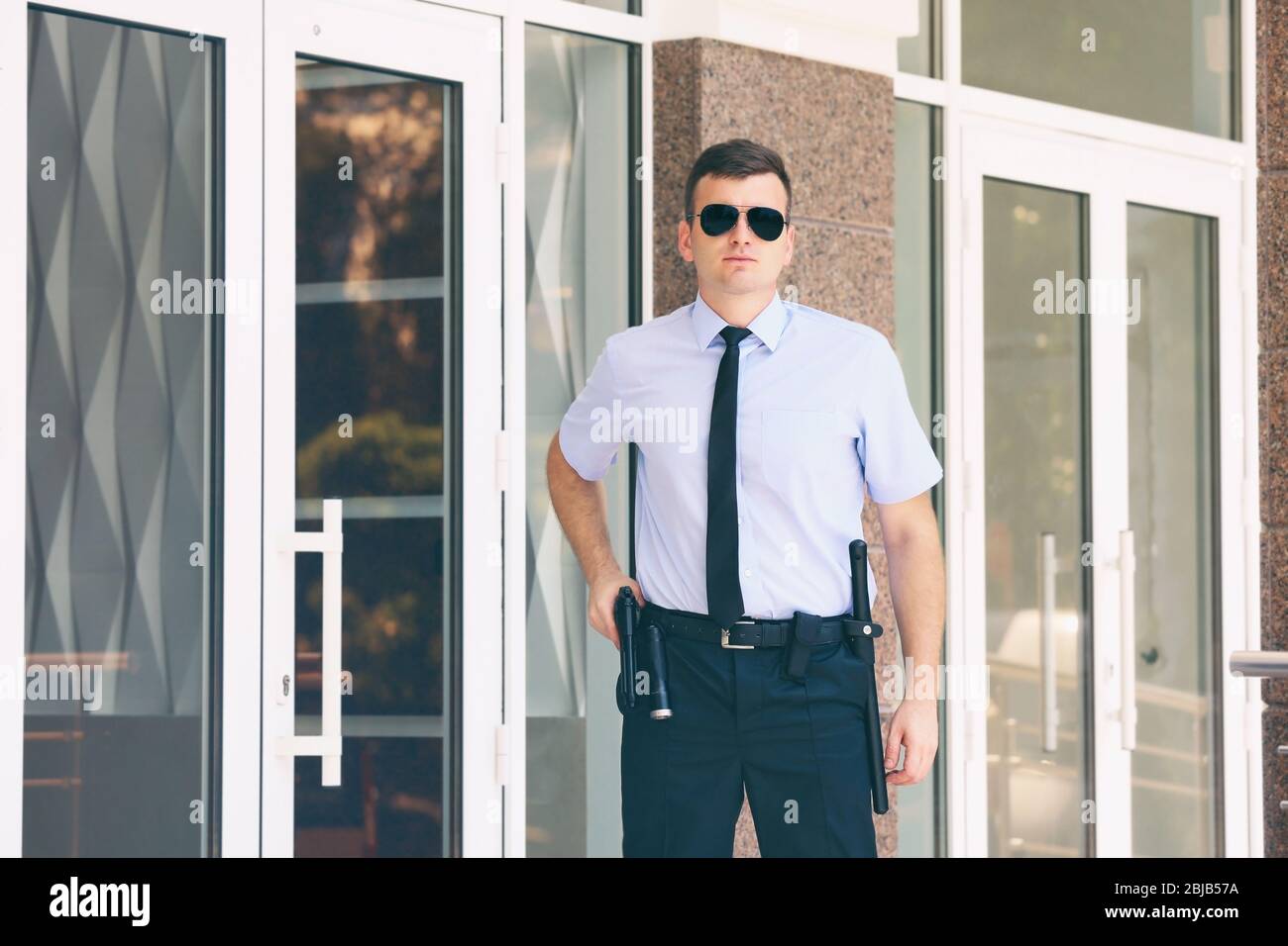 Male security guard, outdoors Stock Photo - Alamy