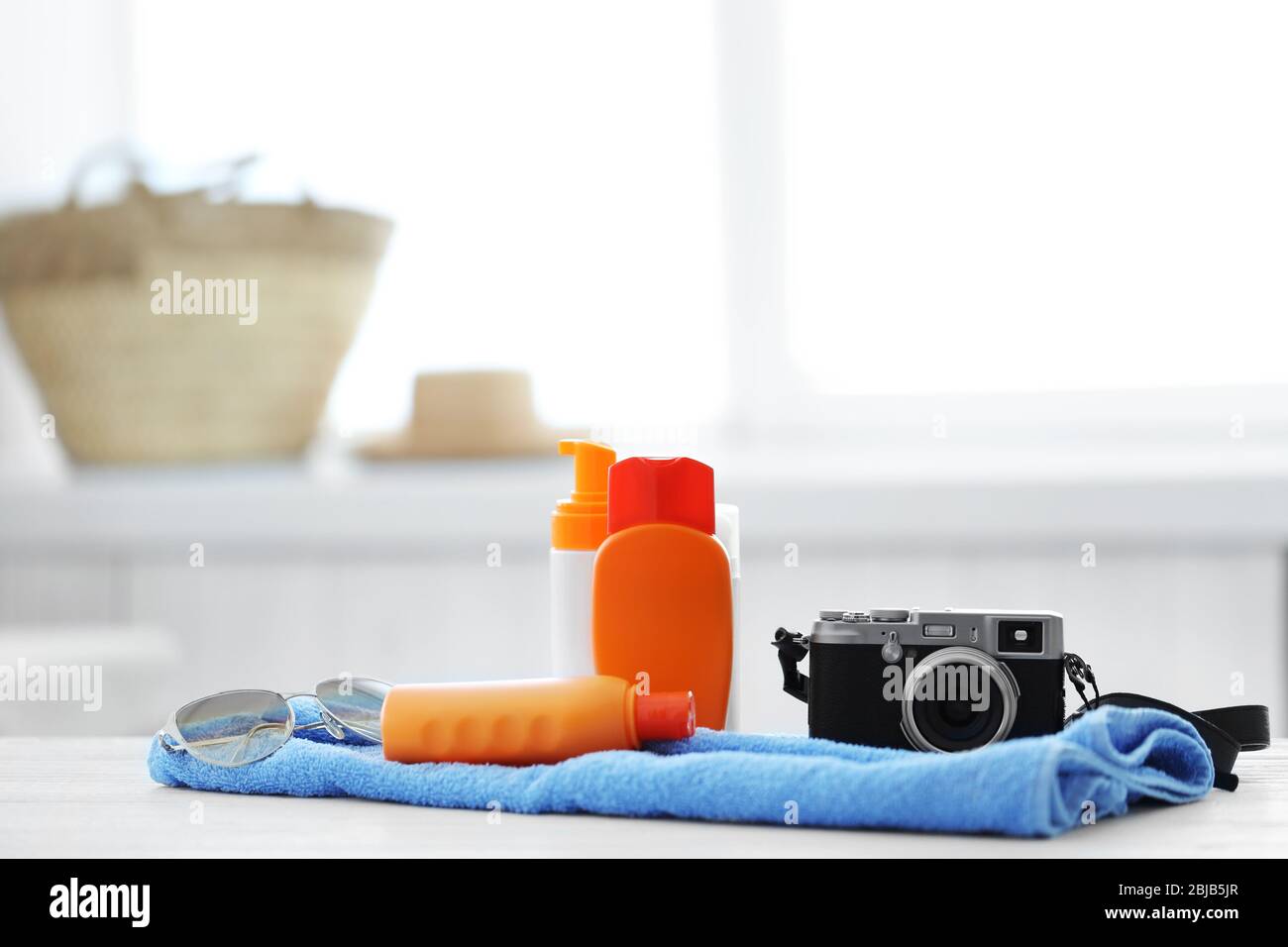 Summer beach set on table in room Stock Photo - Alamy