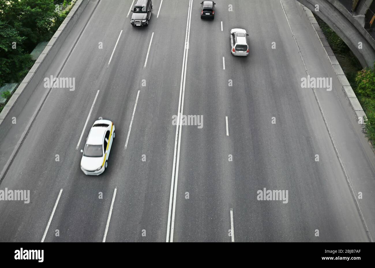 Cars on road Stock Photo - Alamy