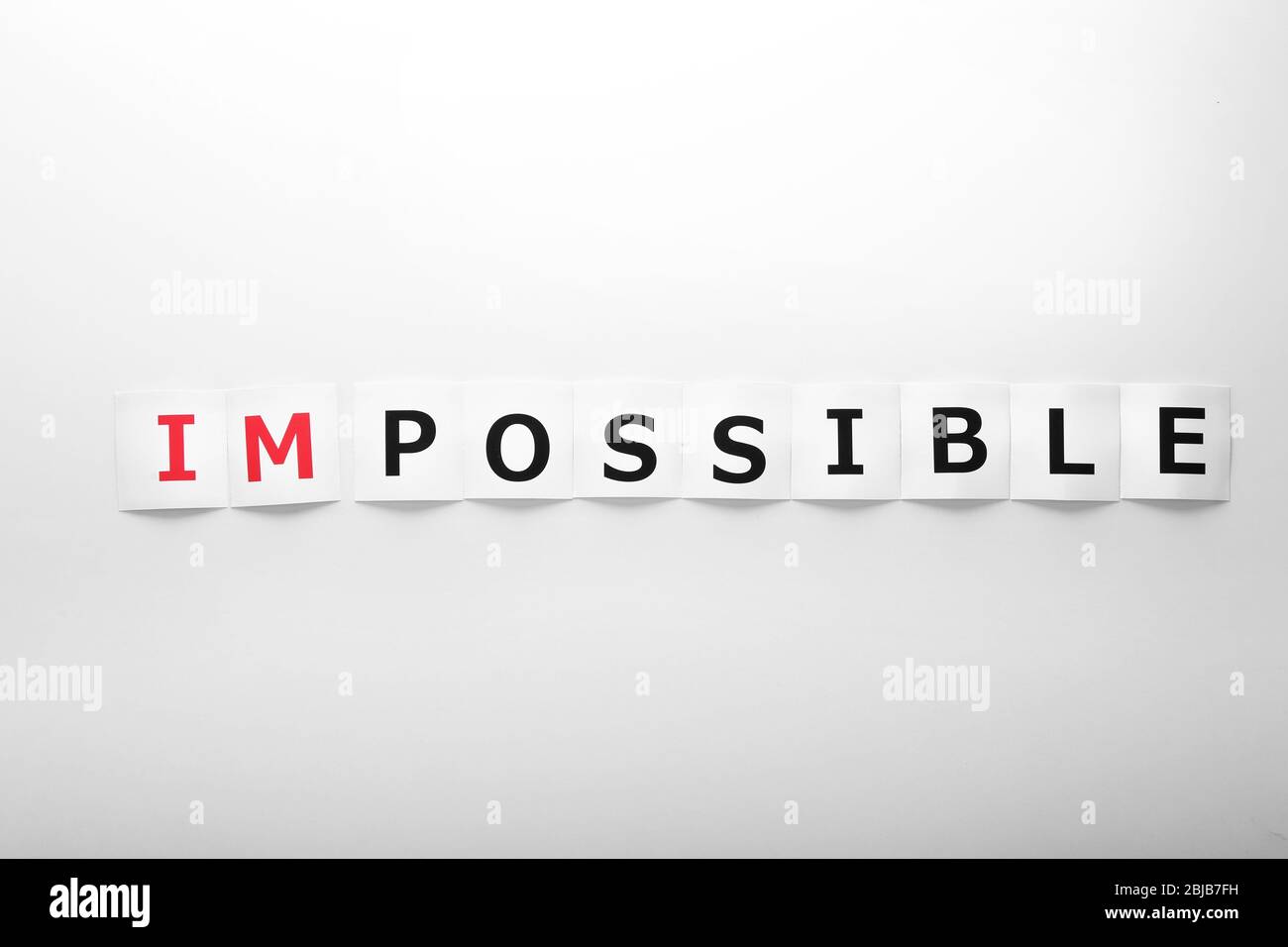 Turning word impossible into possible Stock Photo - Alamy