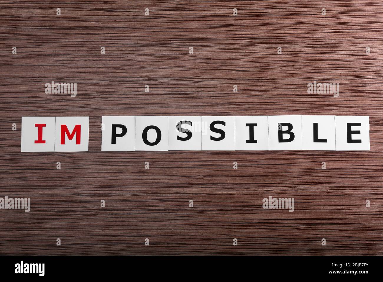 Turning word impossible into possible Stock Photo - Alamy