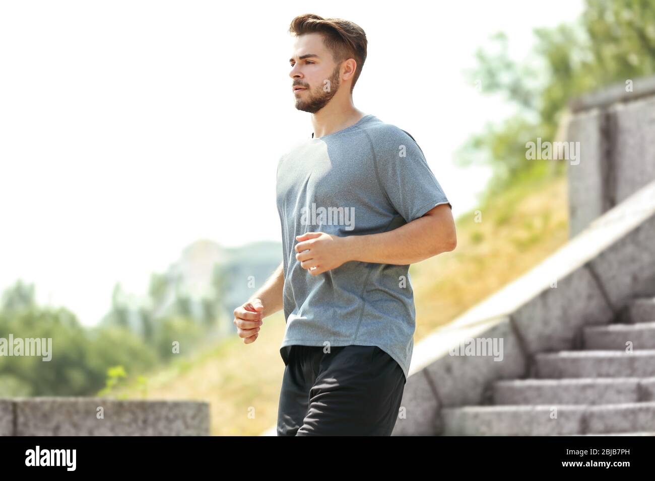 Man running on stairs hi-res stock photography and images - Alamy