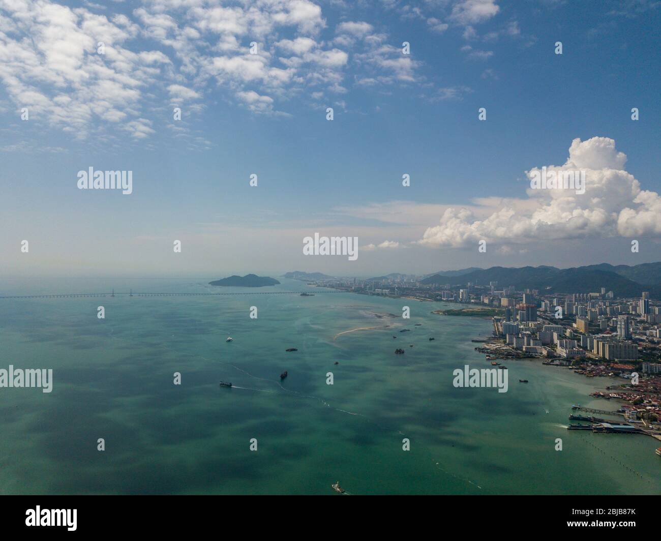 Aerial view cloudy day at Penang Island. Penang Bridge link Seberang ...