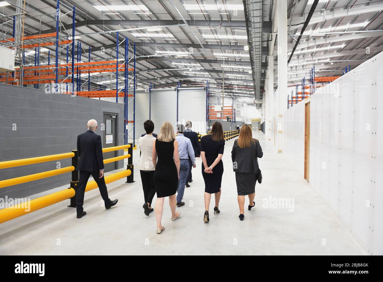 Business people tour a brand new factory in the UK Stock Photo - Alamy
